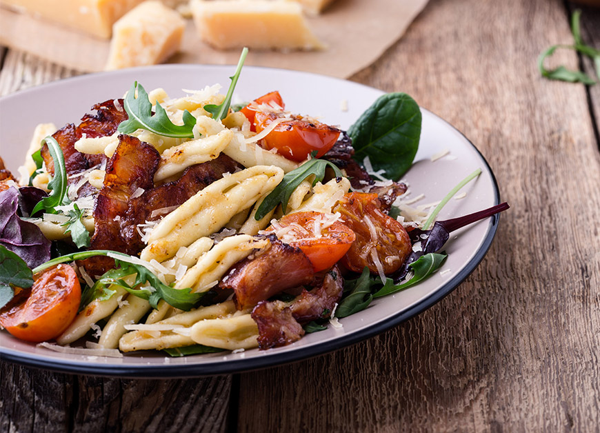Cavatelli con rucola, pomodorini e pancetta croccante - Casa Rustichella