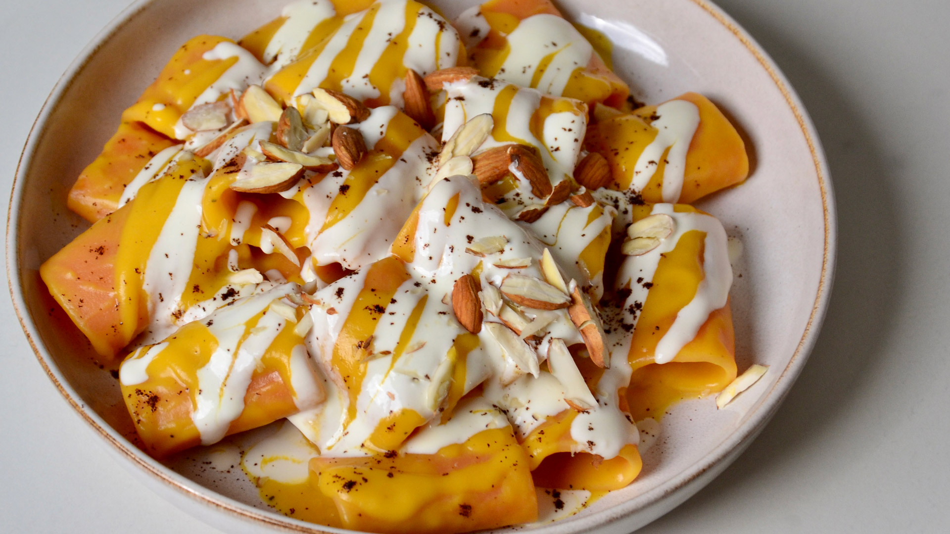 Pumpkin and Mango Paccherini with almonds and pecorino cream - Casa ...